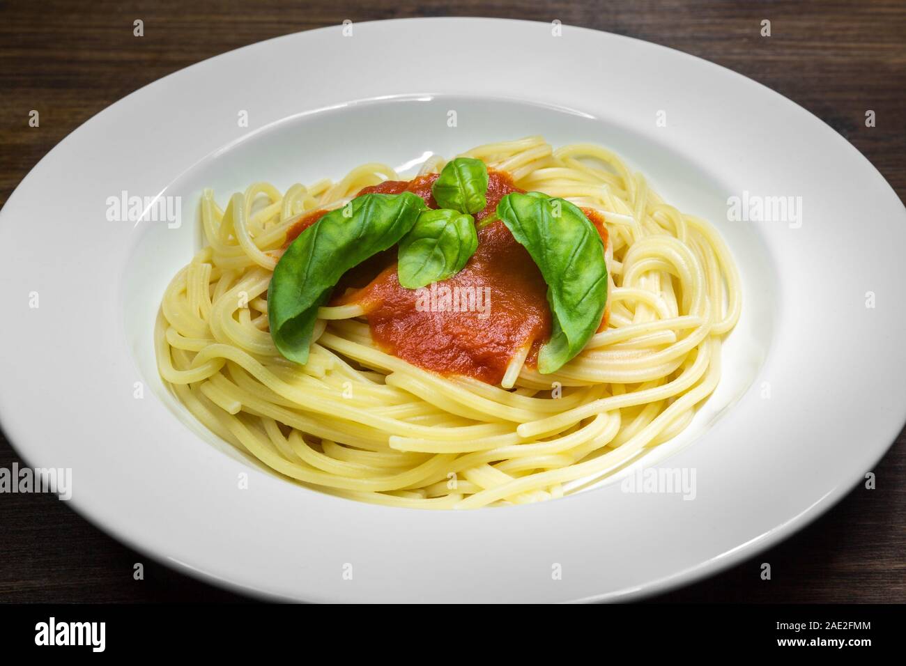 Spaghetti with tomato sauce pachino with fresh basil, a typical dish of ...
