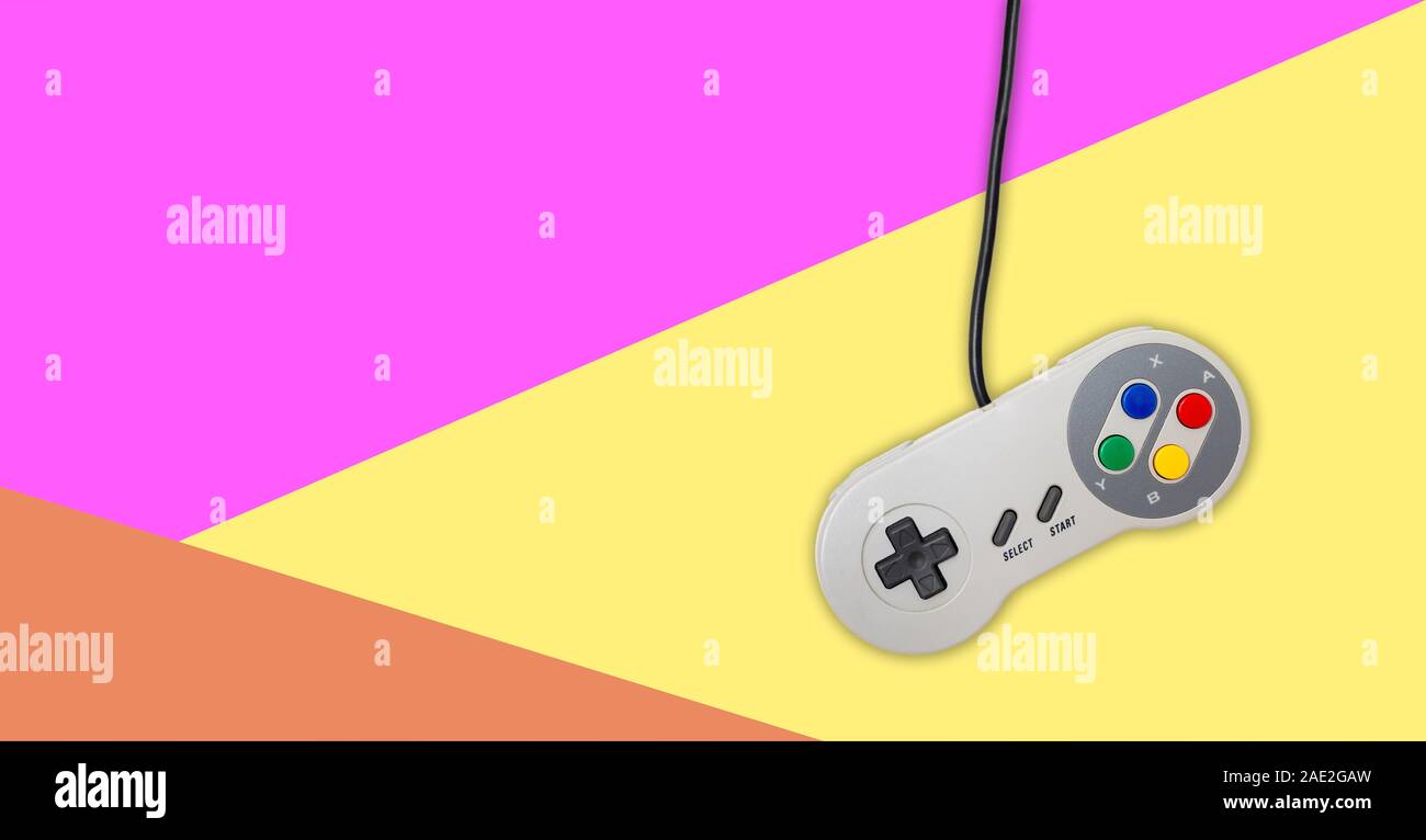 Abstract retro computer gaming controller on colorful background Stock ...