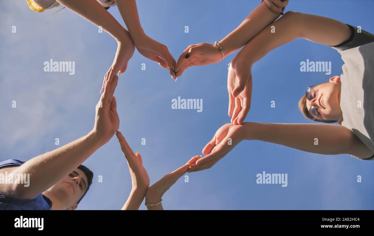 Heart shape hands friends hi-res stock photography and images - Alamy