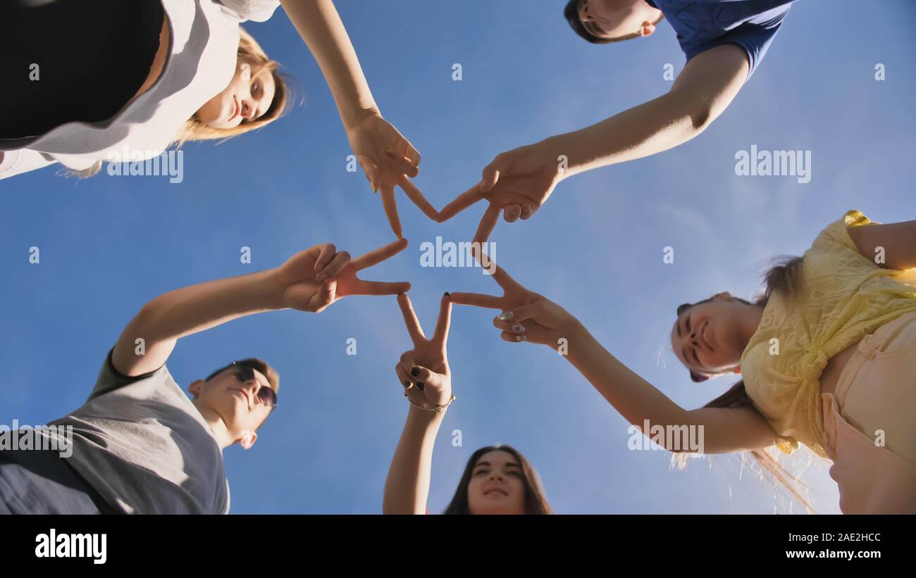 Star shape from friends hands hi-res stock photography and images - Alamy