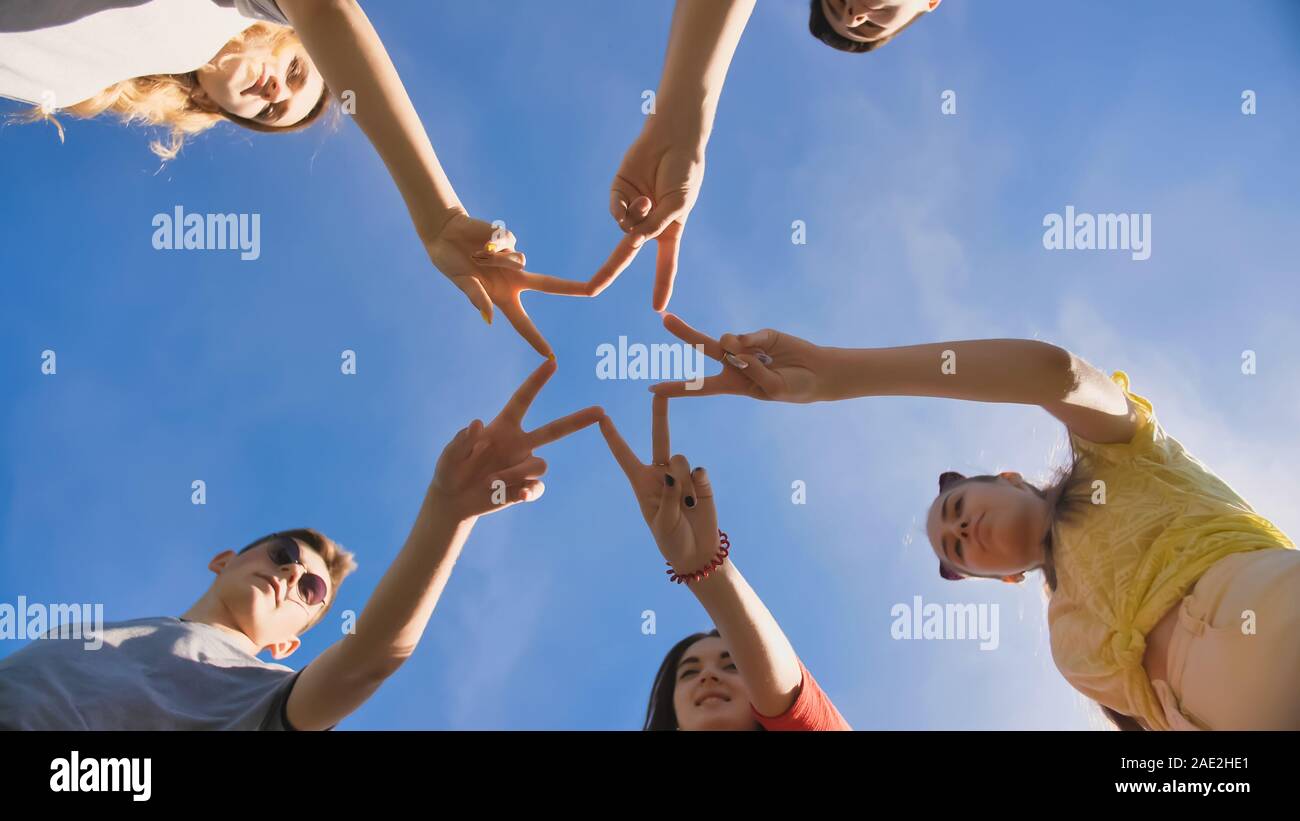 Star shape from friends hands hi-res stock photography and images - Alamy