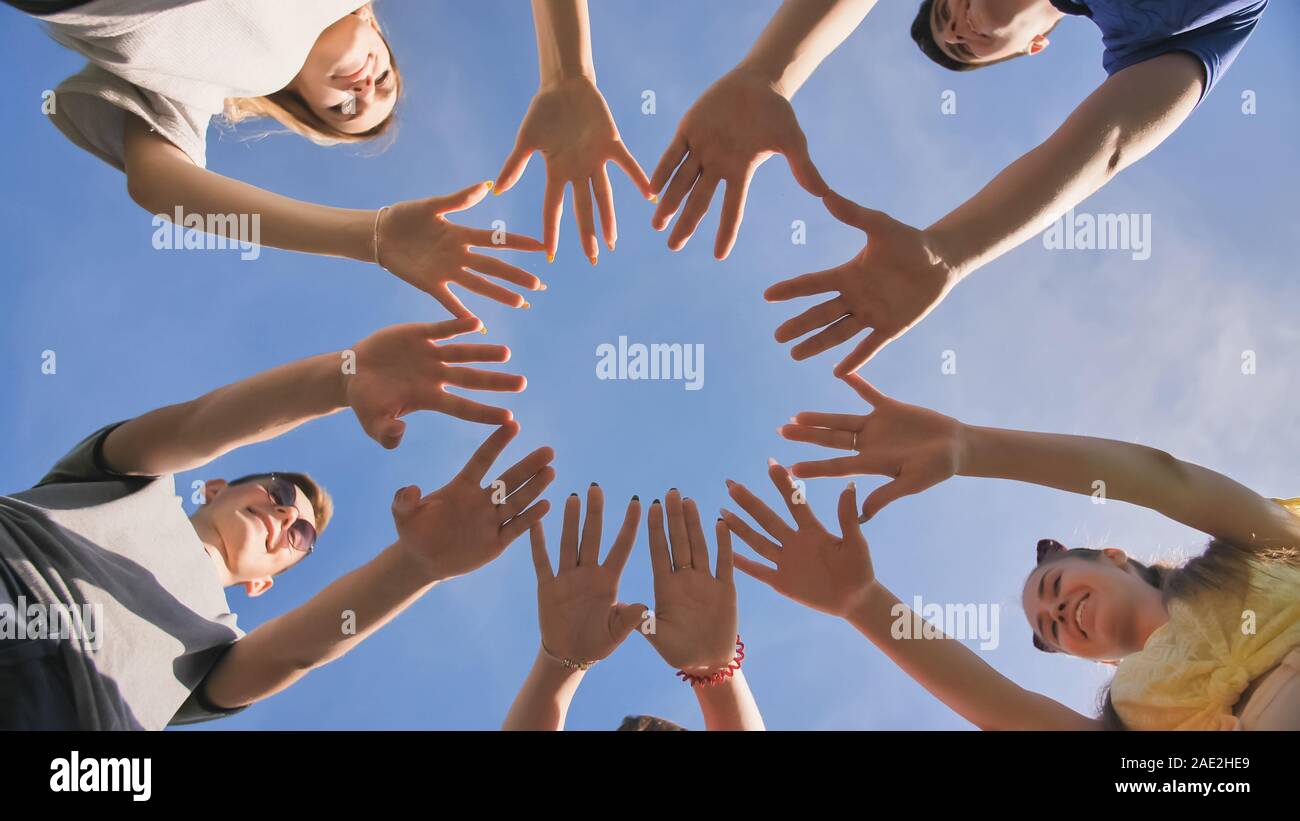 Hands circle teenager hi-res stock photography and images - Alamy