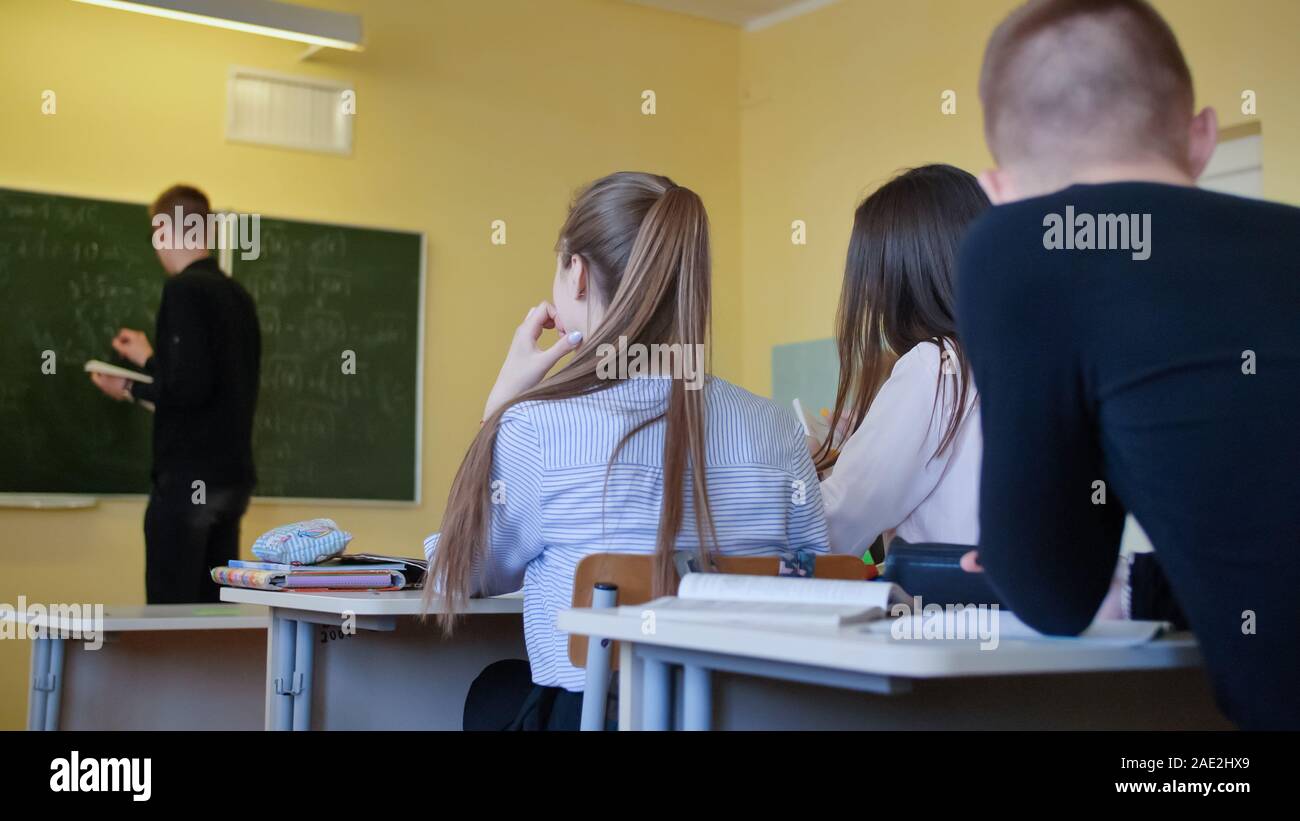 Students in the class are busy with work Stock Photo - Alamy