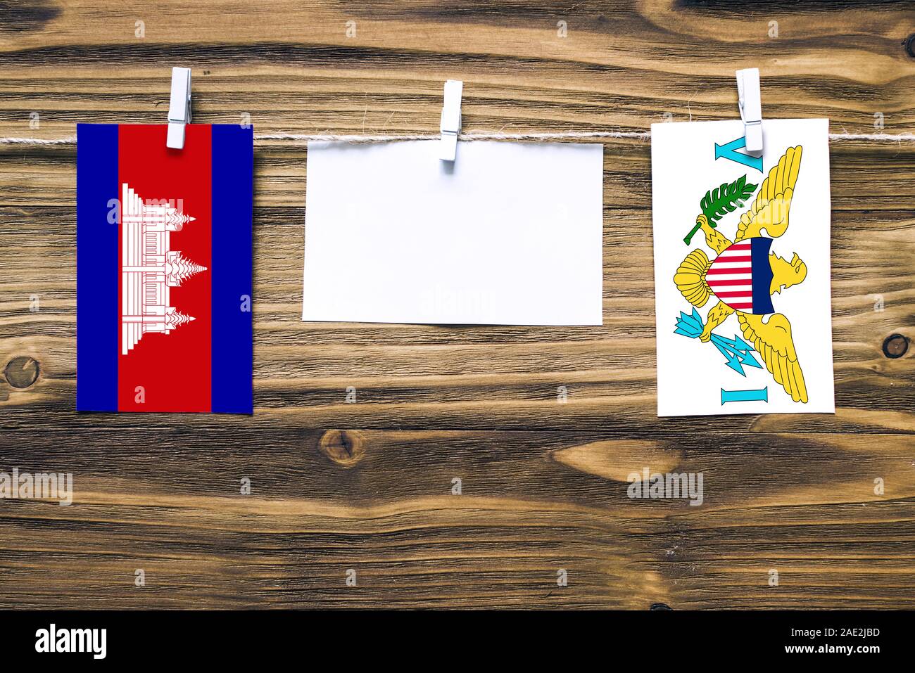 Hanging flags of Cambodia and United States Virgin Islands attached to ...