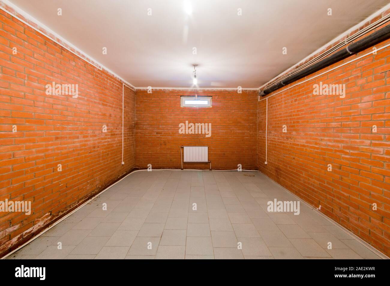 Russia, Omsk- August 02, 2019: interior room empty basement with brick ...