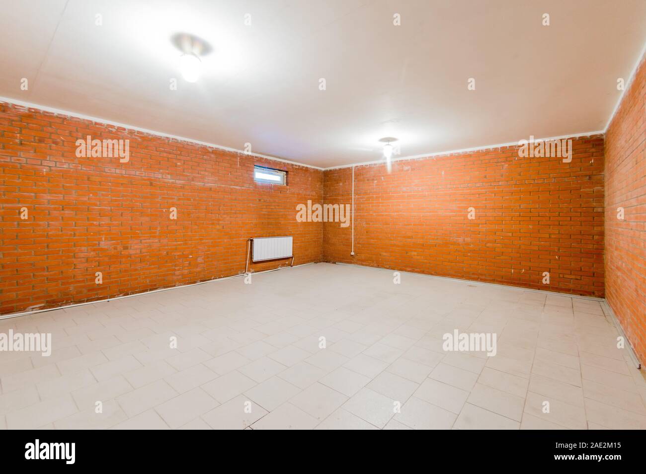 Russia, Omsk- August 02, 2019: interior room empty basement with brick ...