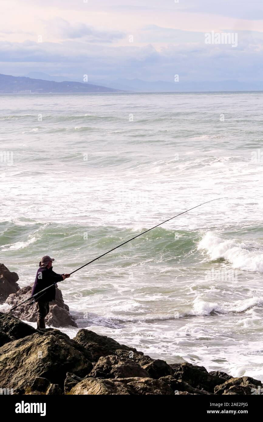 Lonesome fisherman standing on the seaside, Basques Coast - Côte des ...