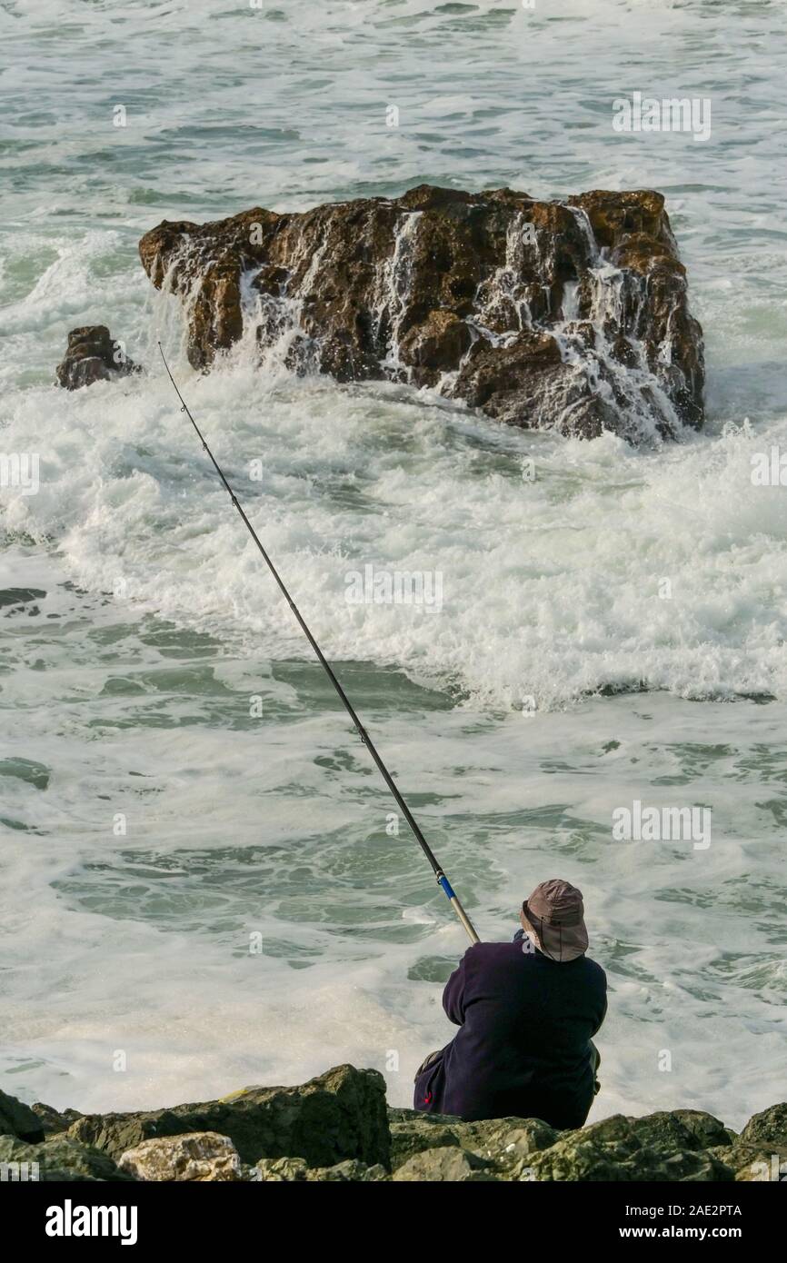 Lonesome fisherman standing on the seaside, Basques Coast - Côte des ...