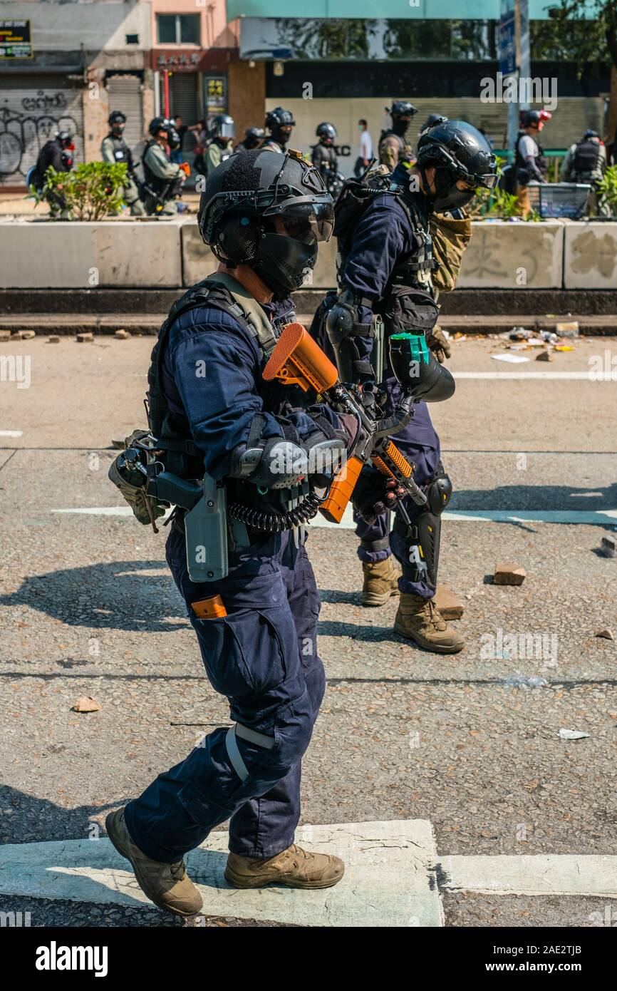 HongKong - November, 2019: Riot police removing bricks and barricades ...