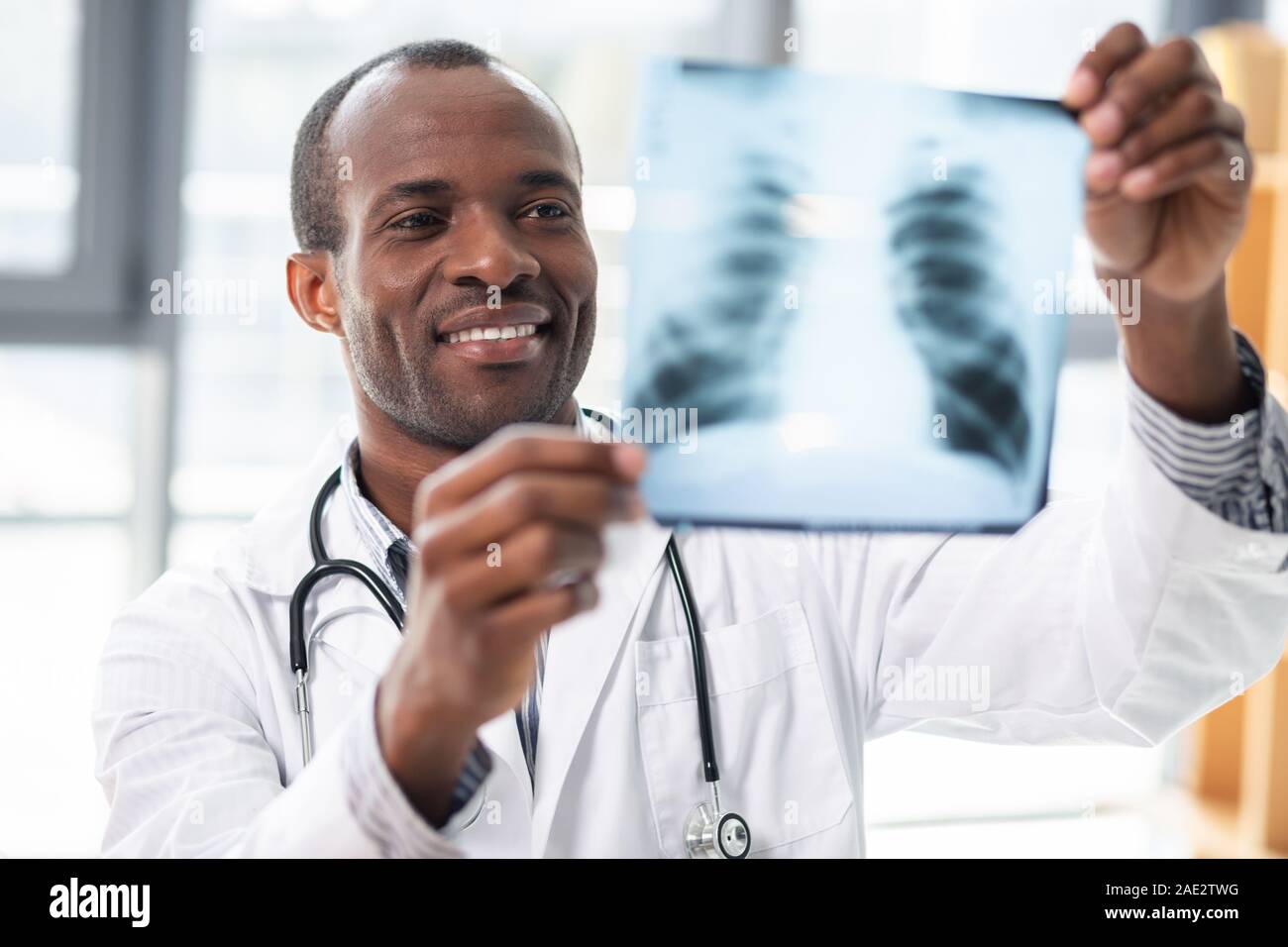Portrait of delighted man while working Stock Photo - Alamy