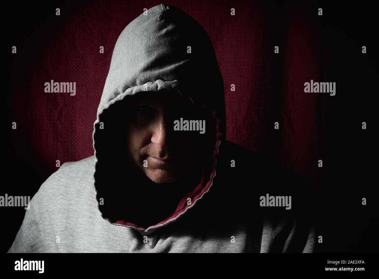 Man wearing hood hi-res stock photography and images - Alamy