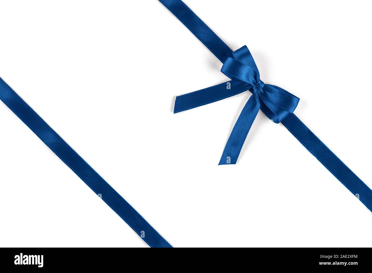 Shiny blue silk ribbon isolated on white background. Festive concept ...