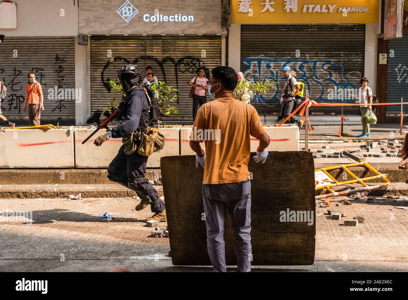 Hongkong - November 18, 2019: Riot police running away after removing ...