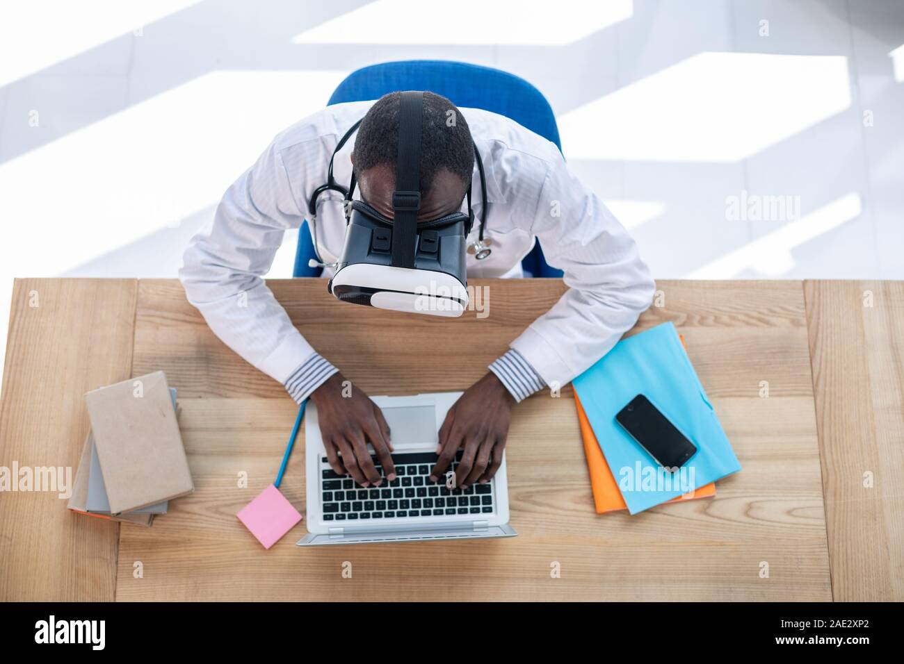 Busy medical worker typing message Stock Photo - Alamy