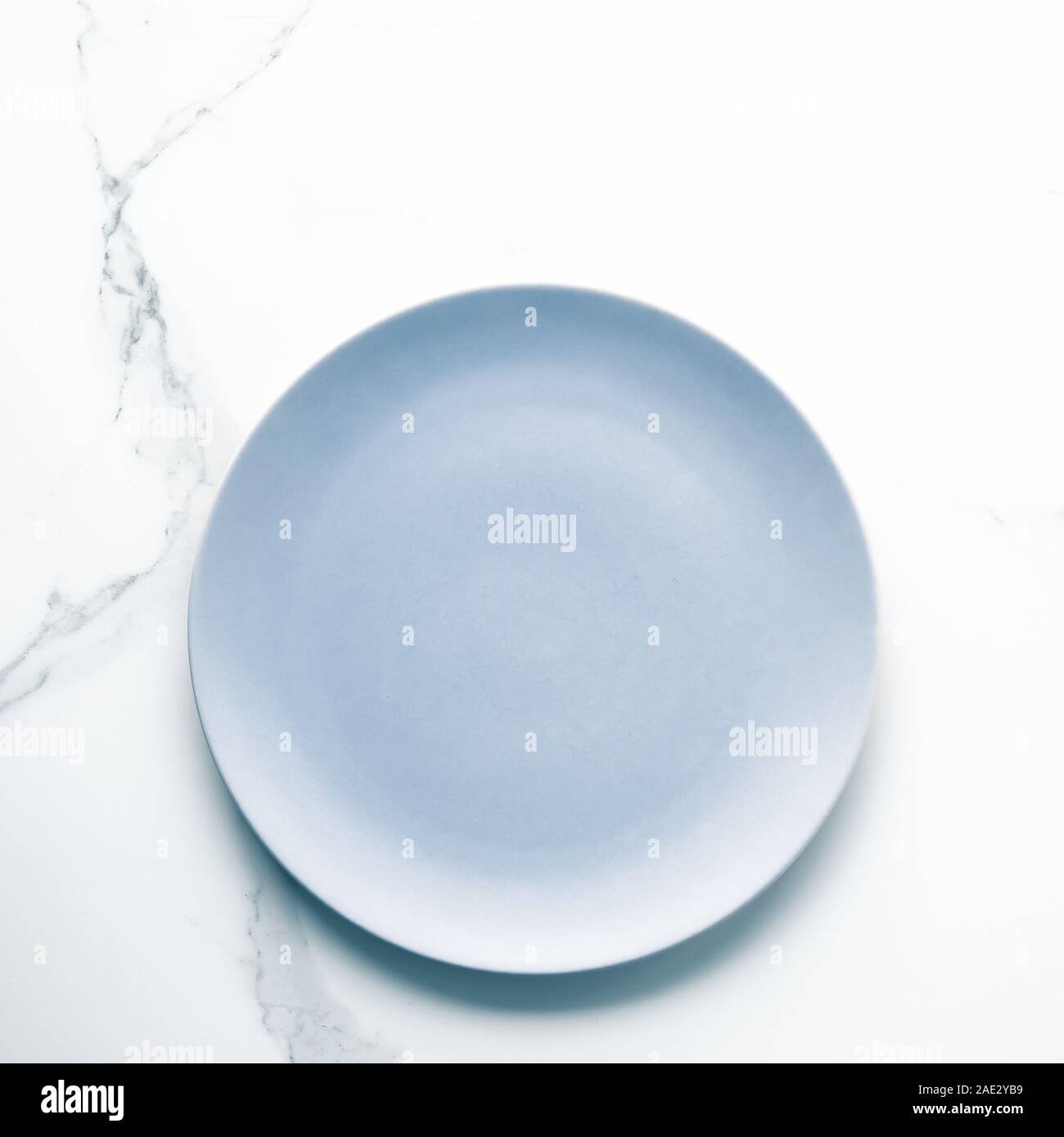 Blue empty plate on marble, flatlay - stylish tableware, table decor ...