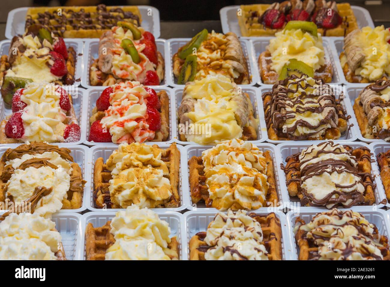 Traditional Belgian waffles with a taste of different jams, chocolates ...