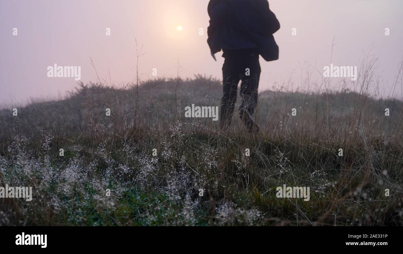 Man running silhouette coat hi-res stock photography and images - Alamy