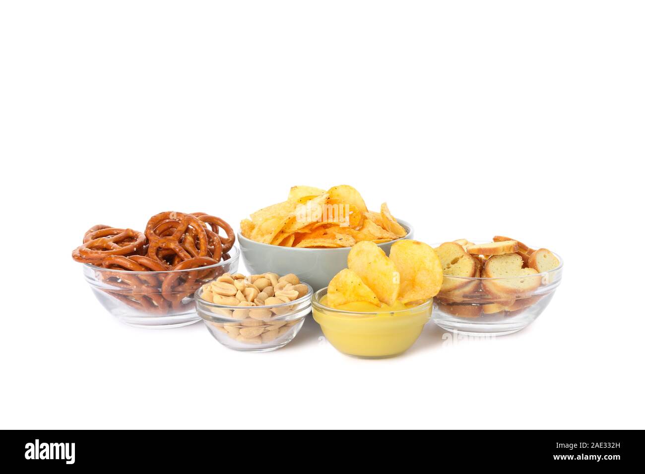 Beer snacks, potato crispy chips, nuts isolated on white background ...
