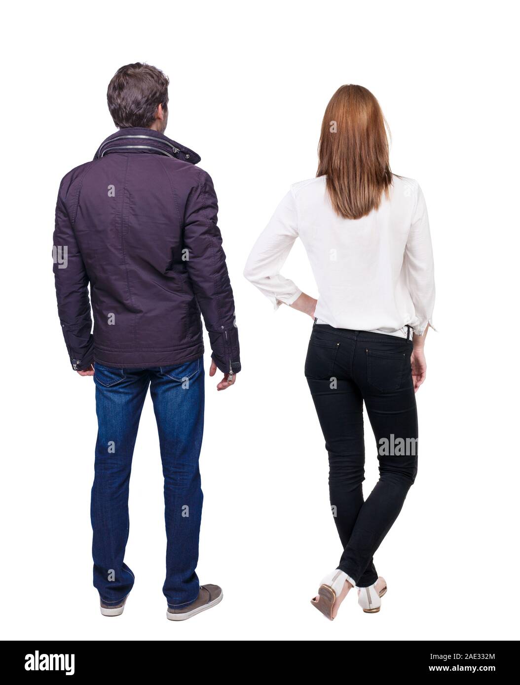 Back view of couple. beautiful friendly girl and guy together. Rear ...