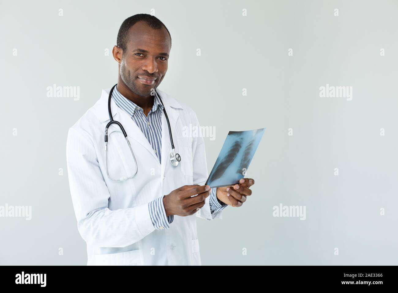 Doctor holding x ray hi-res stock photography and images - Alamy