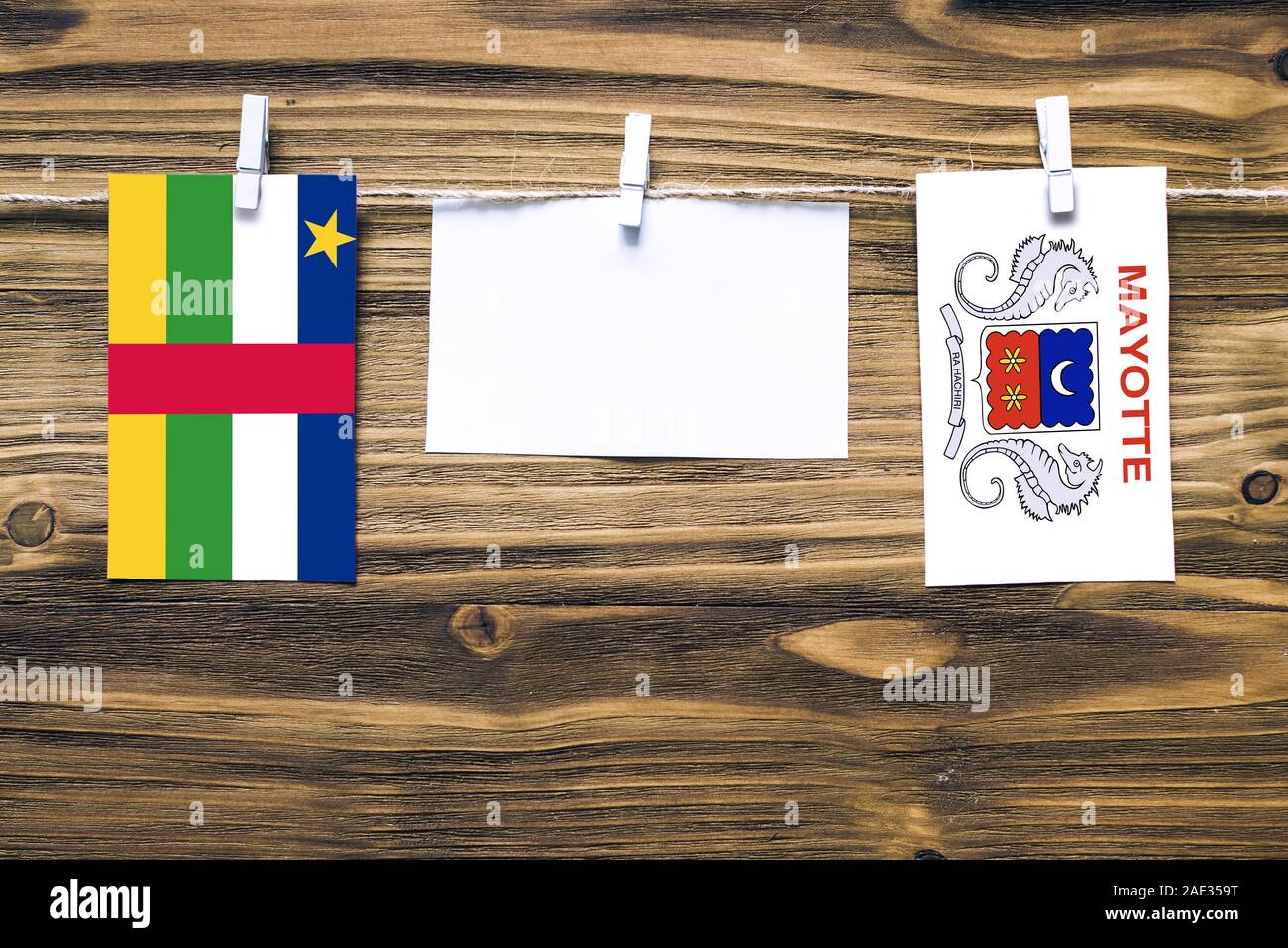 Hanging flags of Central African Republic and Mayotte attached to rope ...