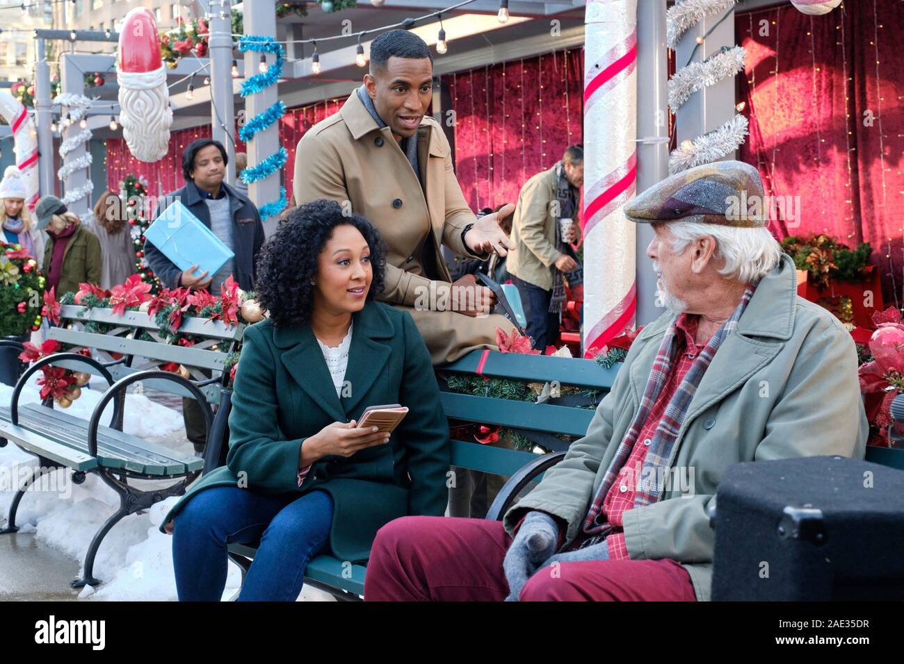 A CHRISTMAS MIRACLE, from left: Tamera Mowry-Housley, Brooks Darnell ...