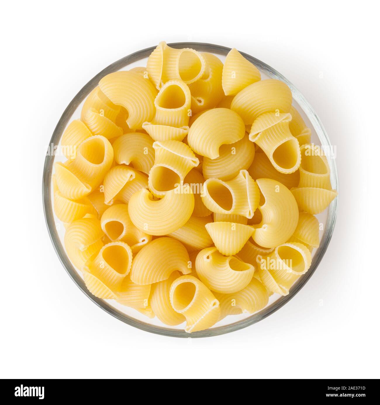 Dried pipe rigate pasta in glass bowl isolated on white background with ...