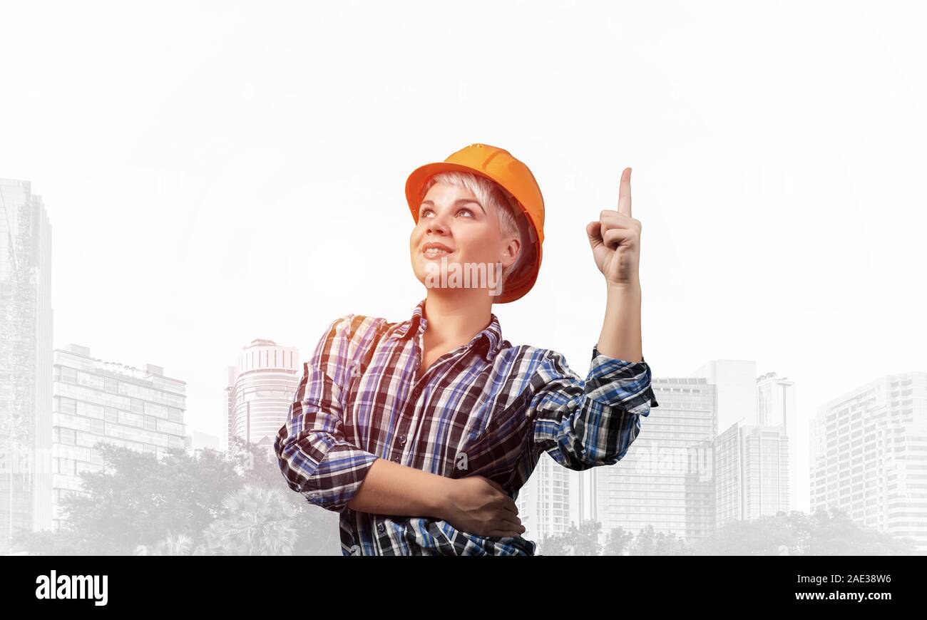 Female builder in hardhat hi-res stock photography and images - Alamy