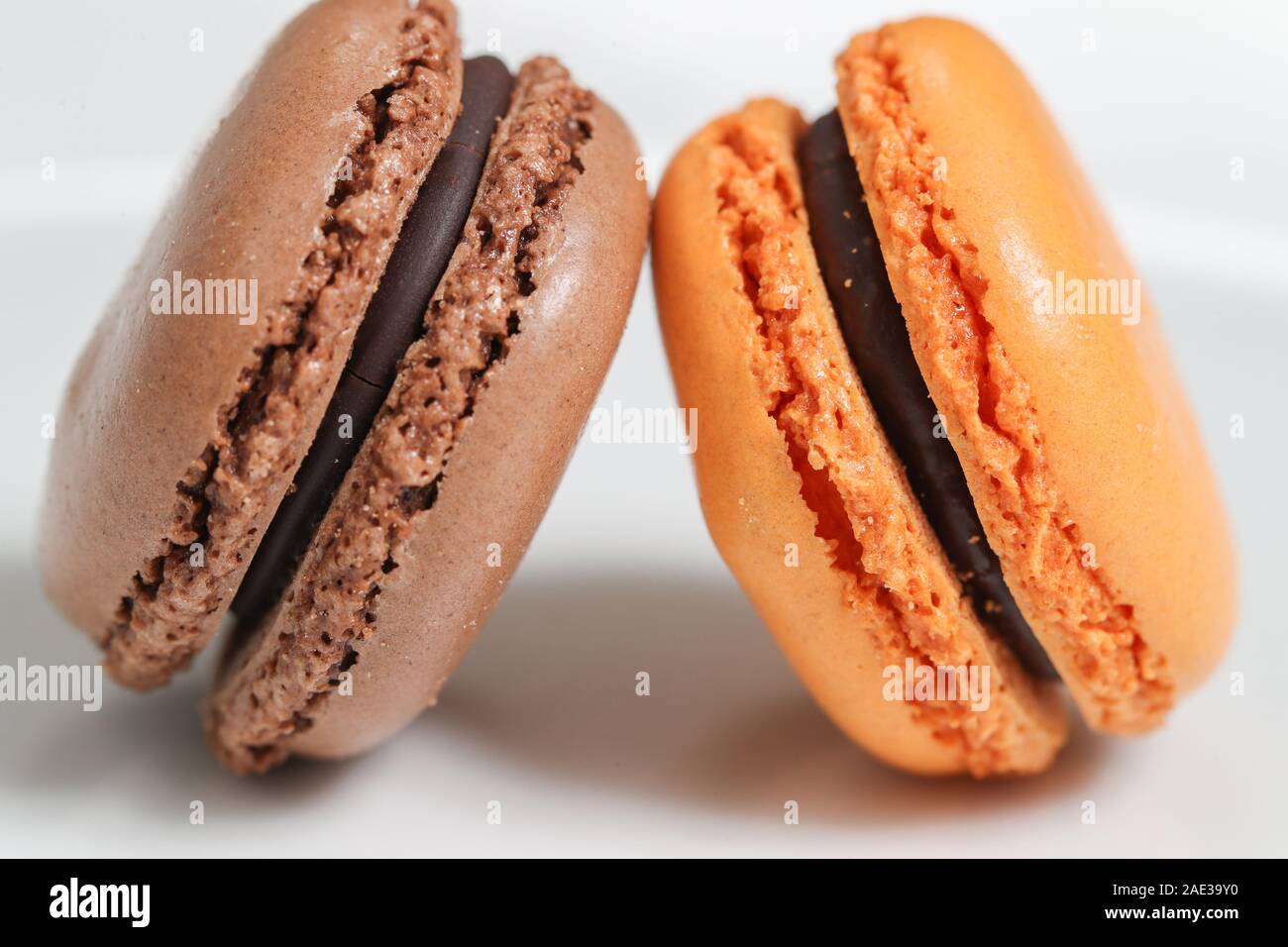 Delicious macaron sweets arranged in rows, colorful macaroon dessert on white background. -Image ...