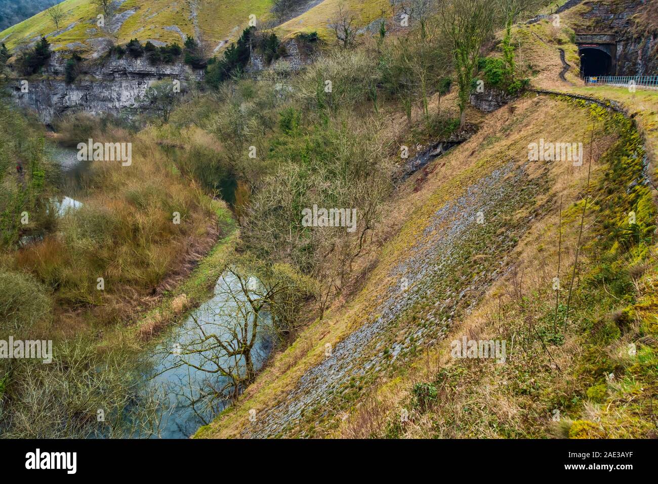 Trackbed of the former railway entering the tunnel portal between ...