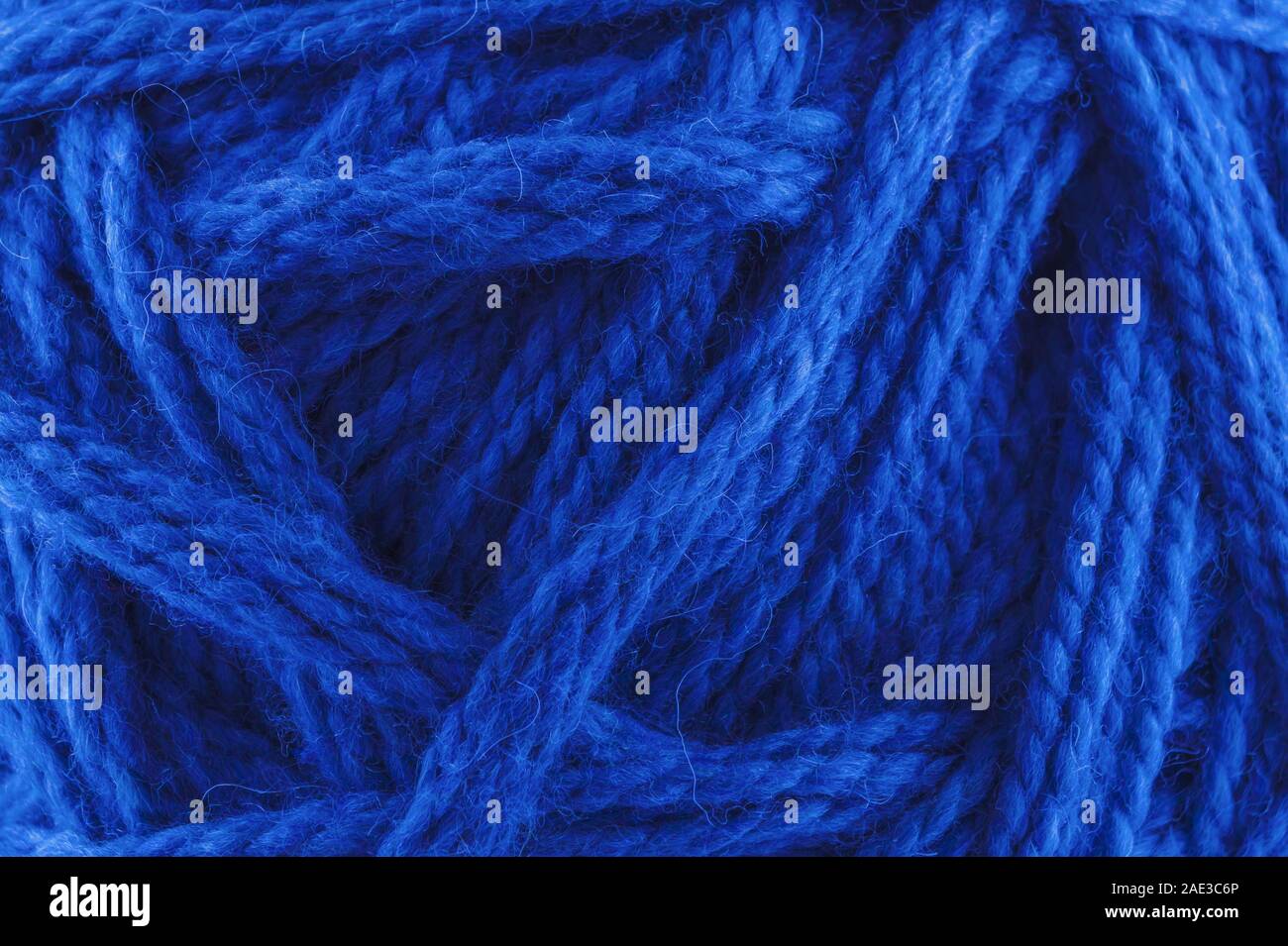 Cozy photo background of large wool yarn. Classic Blue Stock Photo - Alamy