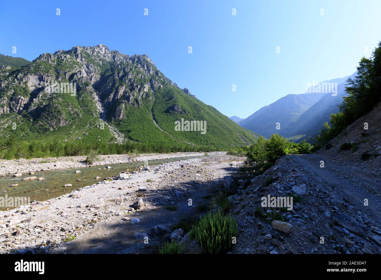 Mountainous landscape with green forests and clear rivers in the ...