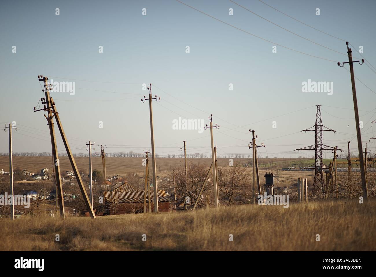 Power lines in rural village hi-res stock photography and images - Alamy