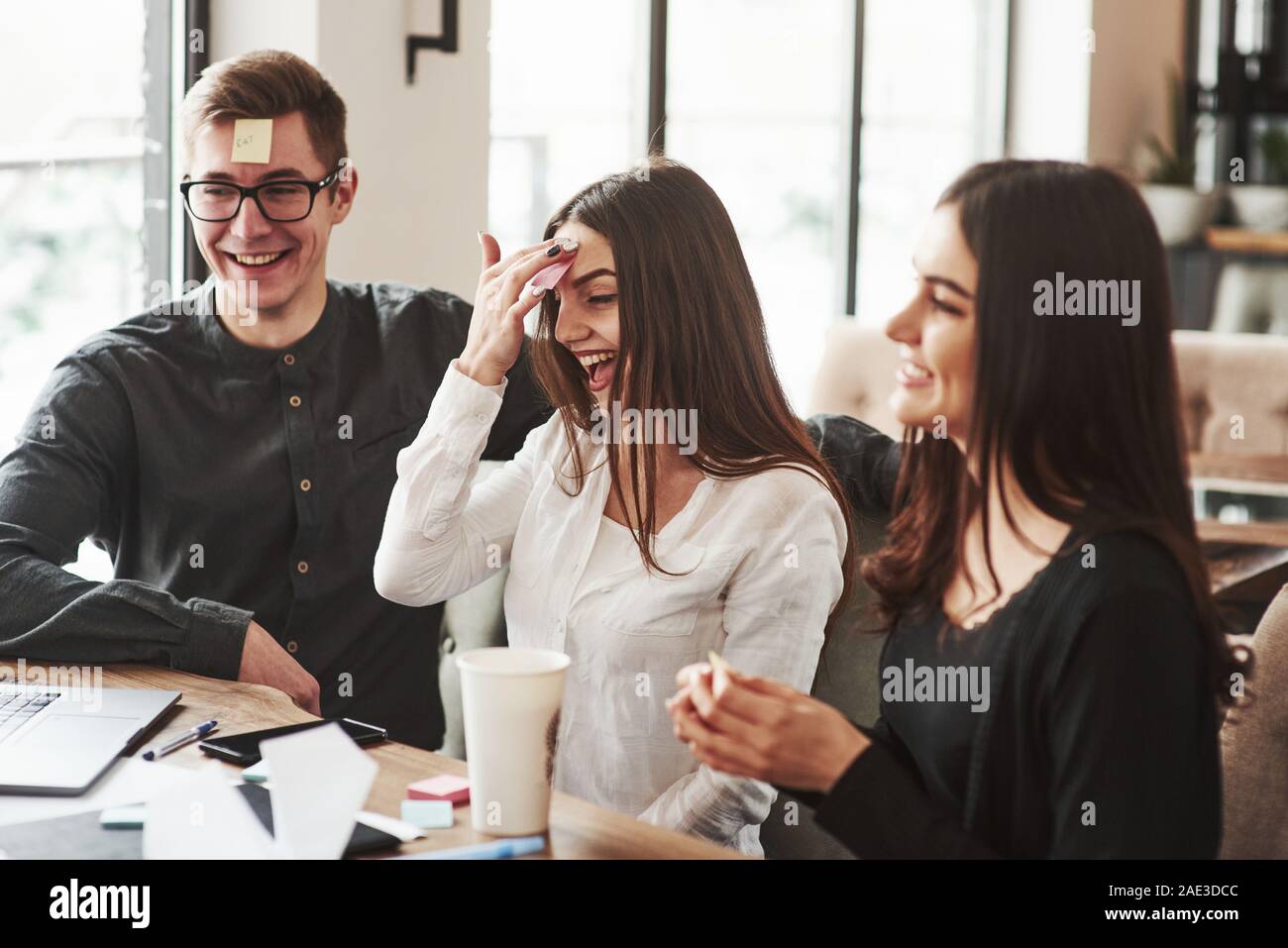Relaxing games. Having fun in the office room. Friendly coworkers ...