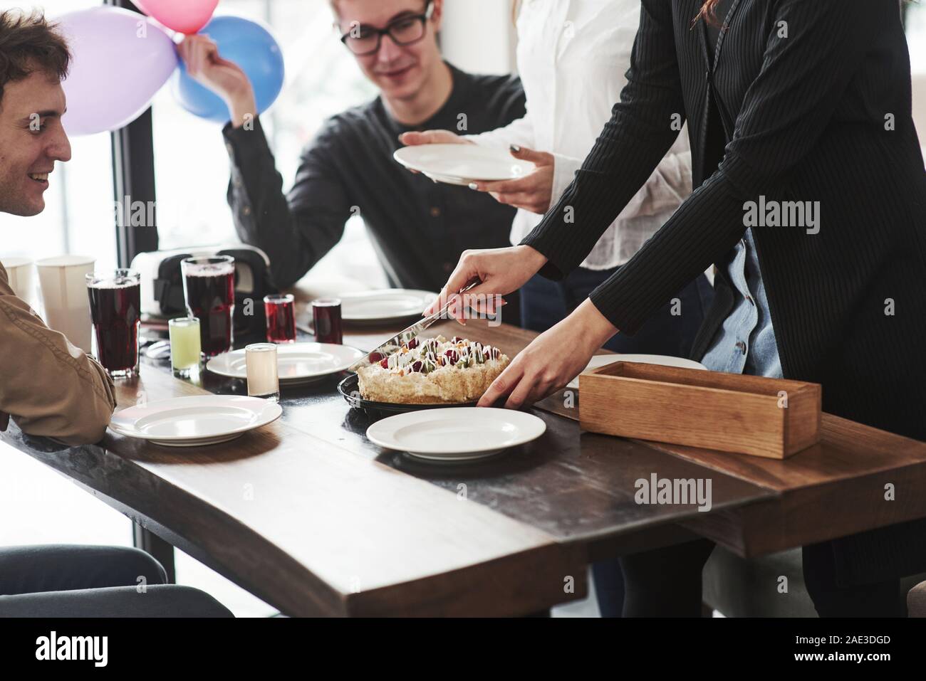 Cake is finally slicing. One of employees have birthday today ...
