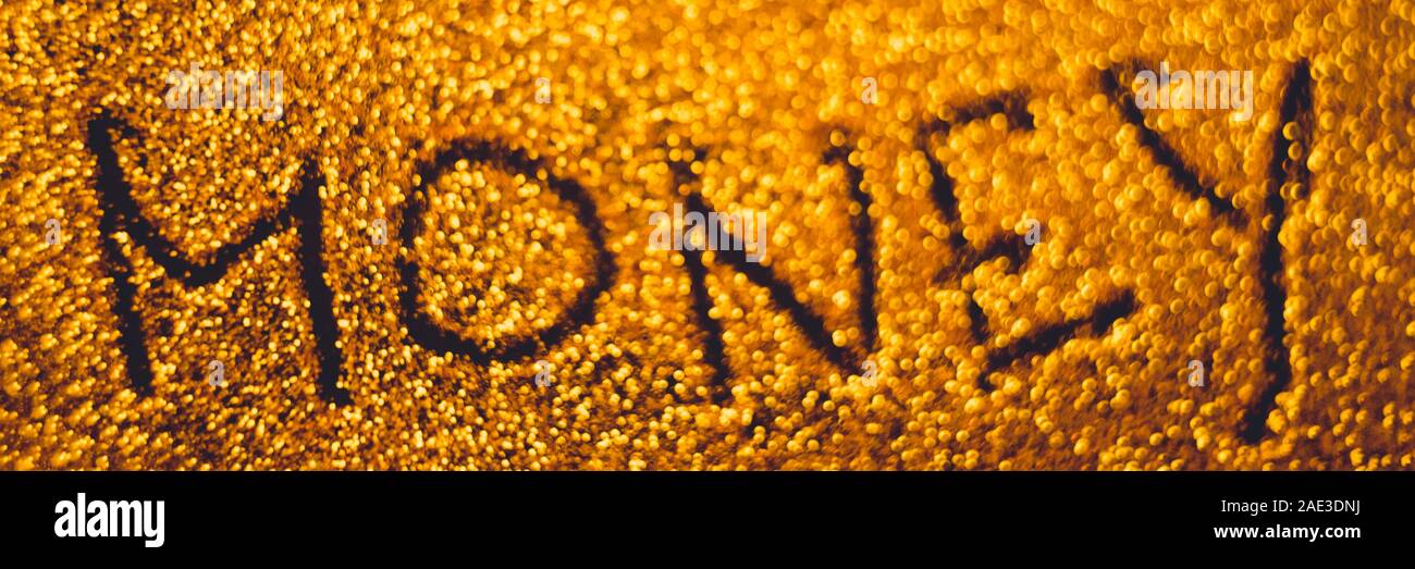 Text Money on golden shiny background, business banner Stock Photo - Alamy
