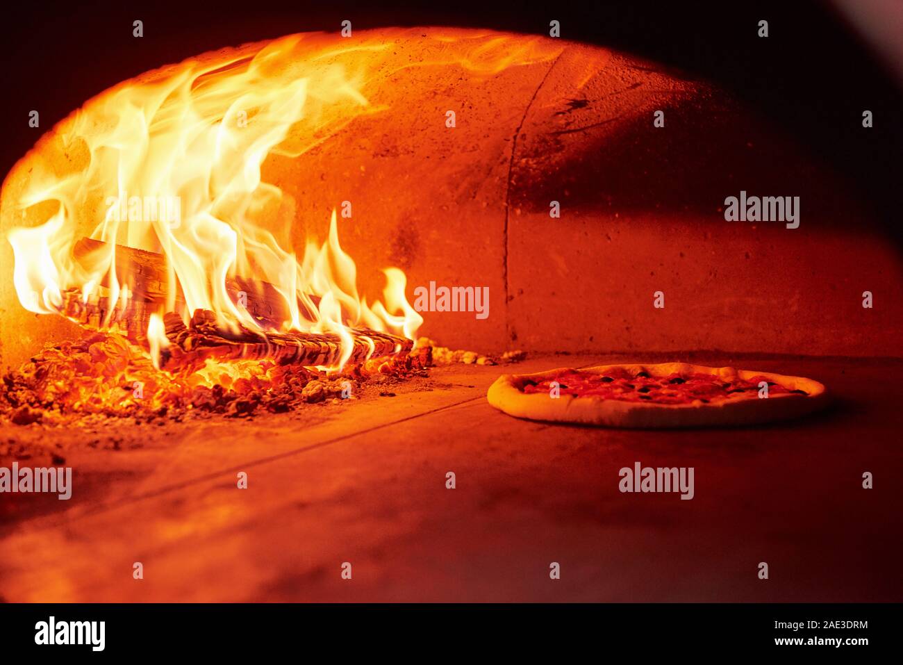 Process of cooking. Fire burning in the furnace. Close up view of wood ...