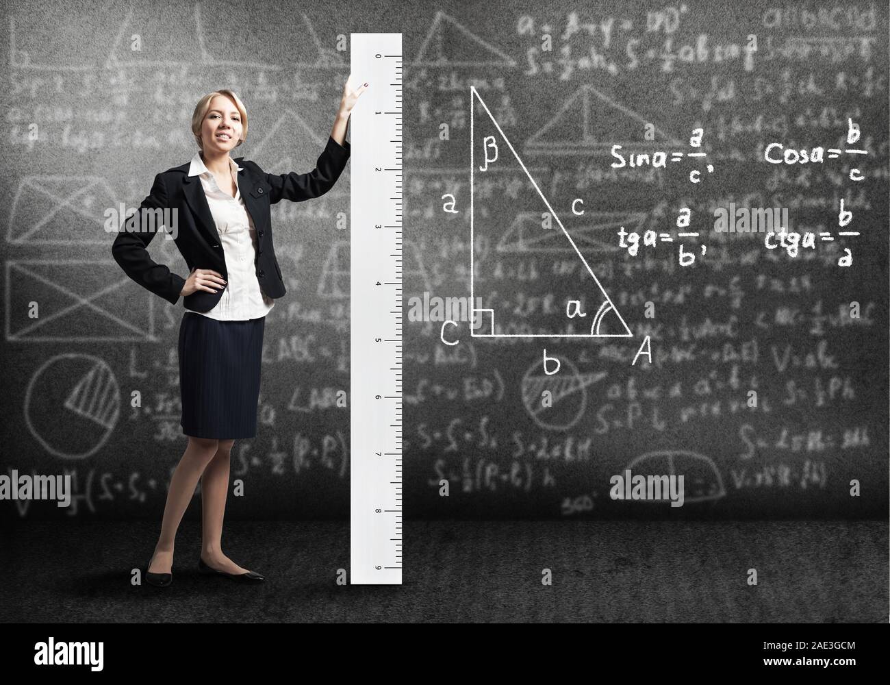 Young female teacher teaching maths hi-res stock photography and images ...