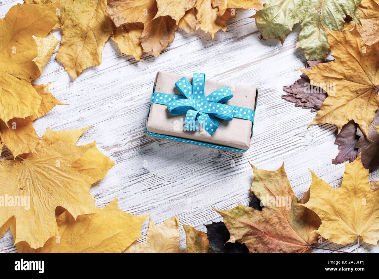 Flat lay autumn composition with gift box Stock Photo - Alamy