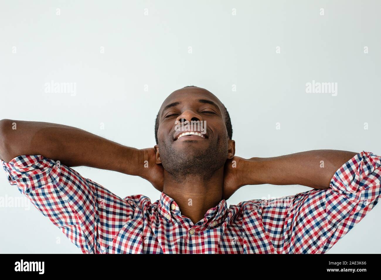 Happy stylish relaxed african man hi-res stock photography and images ...
