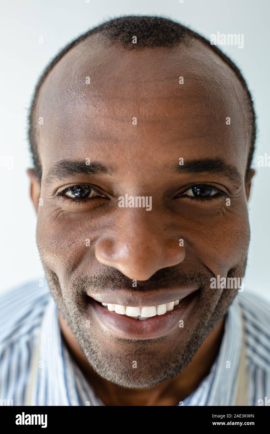 Handsome black man smiling face hi-res stock photography and images - Alamy