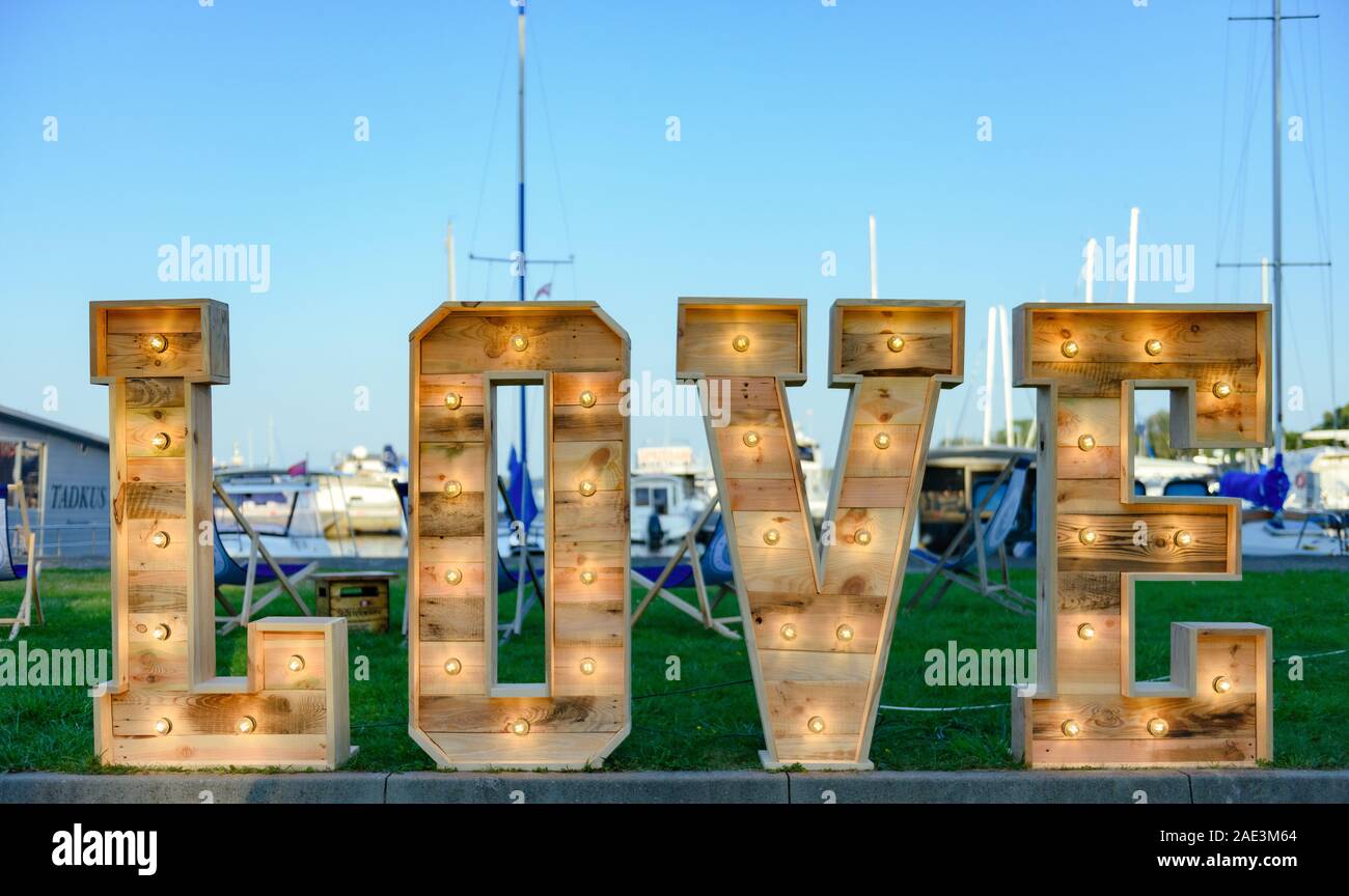 Illuminated Love sign in large letters at a wedding reception Stock ...