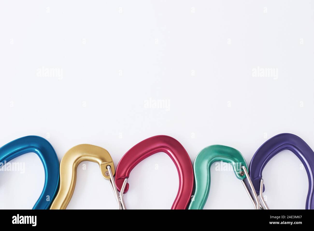 Safety first. Many of the multi colored carabiners on lying on the ...