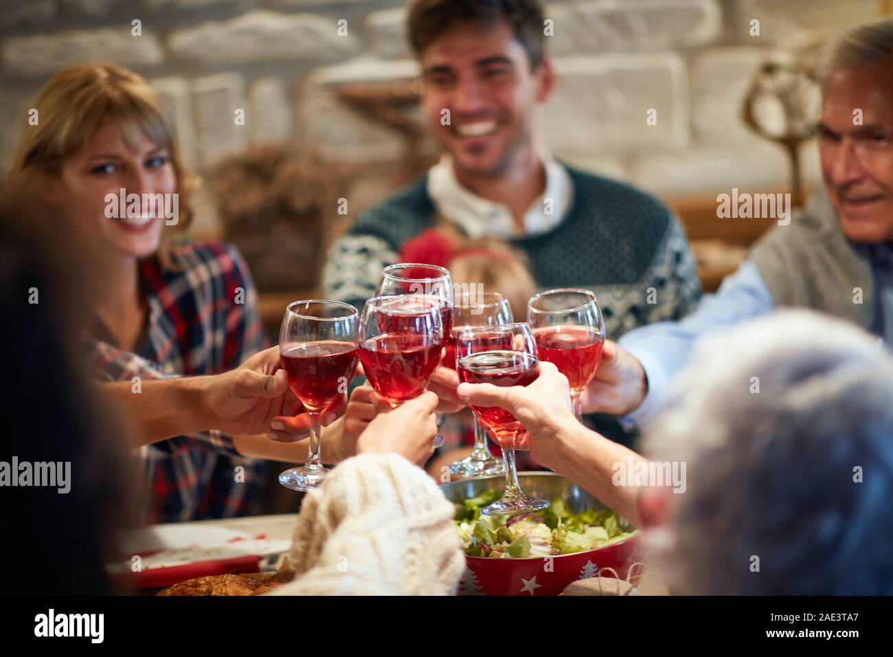 People cheering dinner hi-res stock photography and images - Alamy