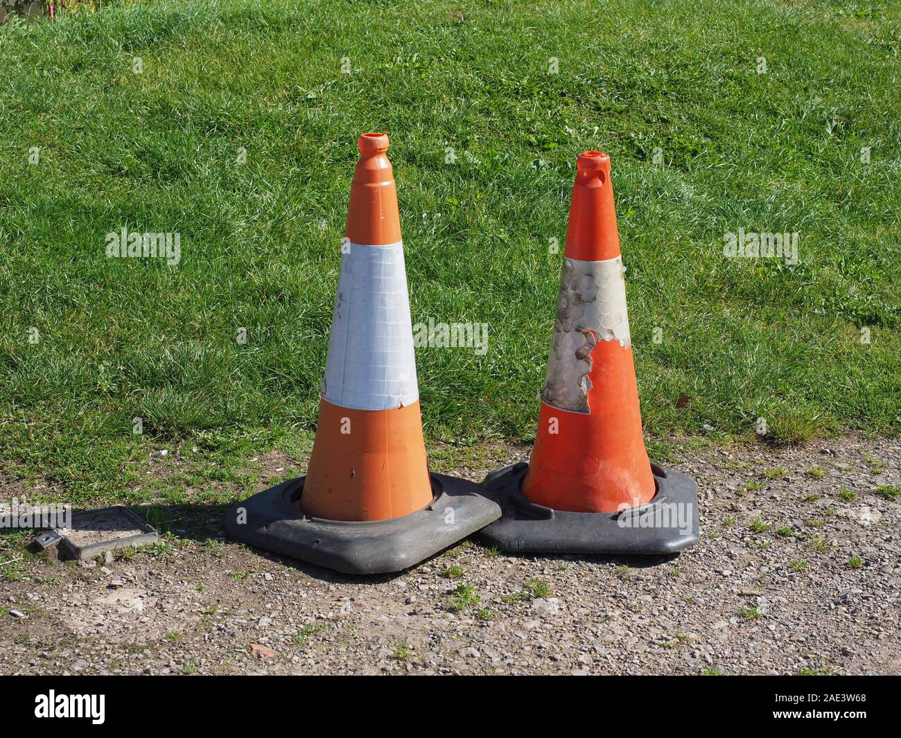 traffic cones to mark road works or temporary obstruction traffic sign ...