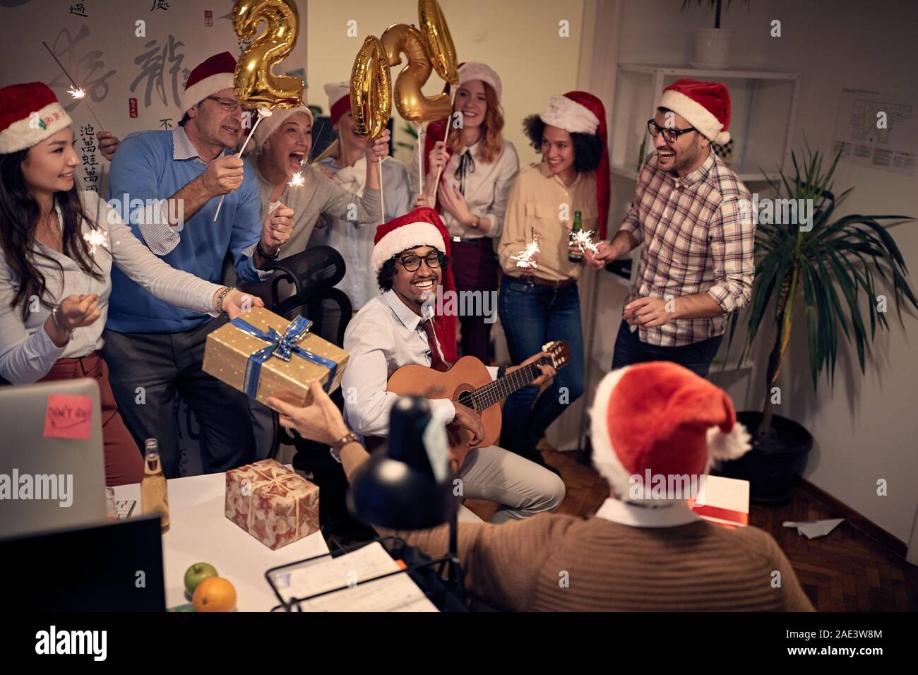 happy Business team celebrating new 2020 year in office Stock Photo - Alamy