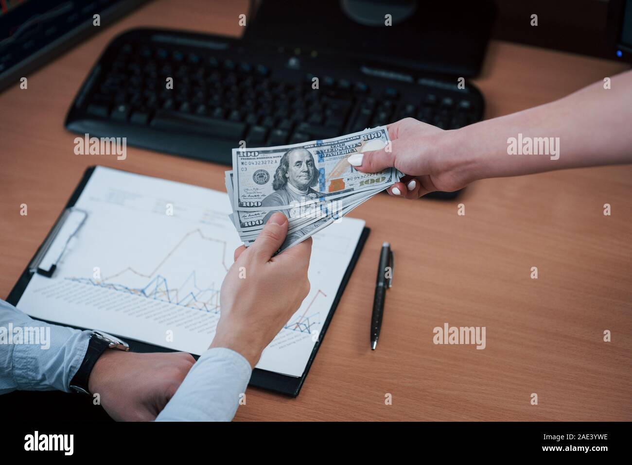 Financial success. Day of salary in the modern office with screens with ...