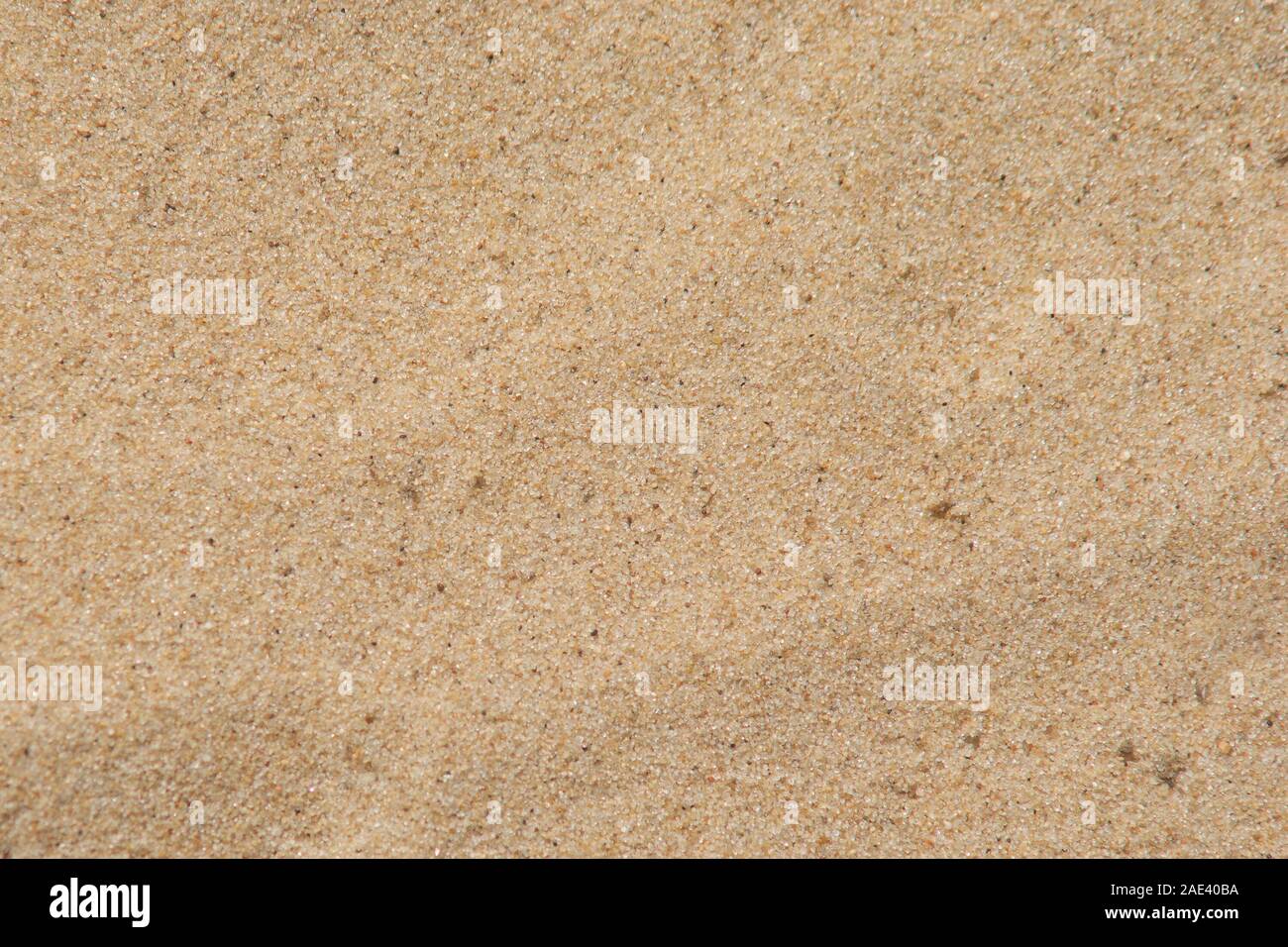Brown sea sand on beach as background top view closeup Stock Photo - Alamy