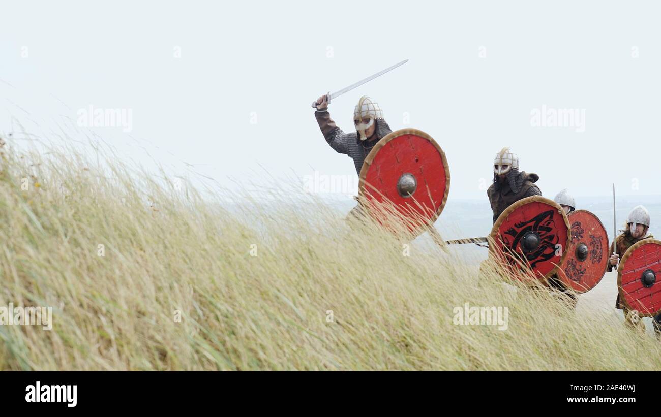 Army Leader Inspires his Warriors with battle speech and raises sword ...