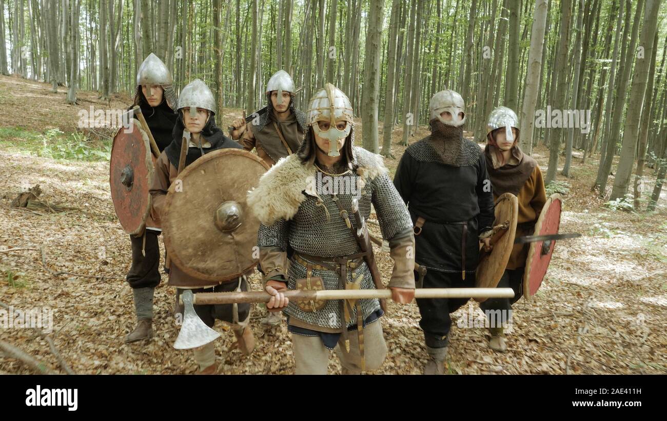 Vikings running in the forest to fight in a battle Stock Photo - Alamy